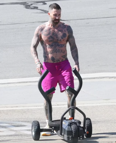 Adam Levine Flaunts Tattoos and Toned Physique in Shirtless Santa ...